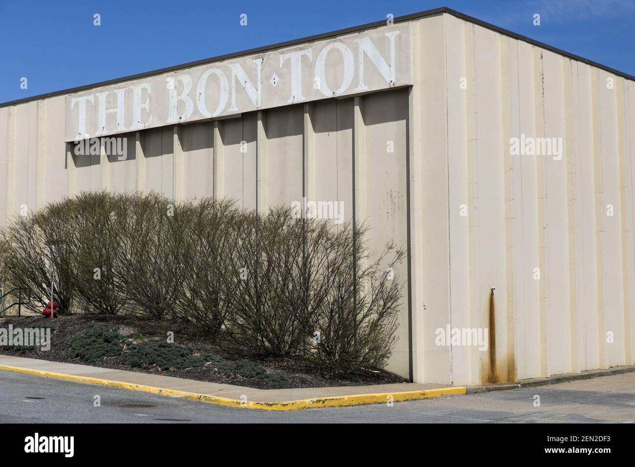 The outline of a The Bon-Ton logo sign outside of a closed retail store ...