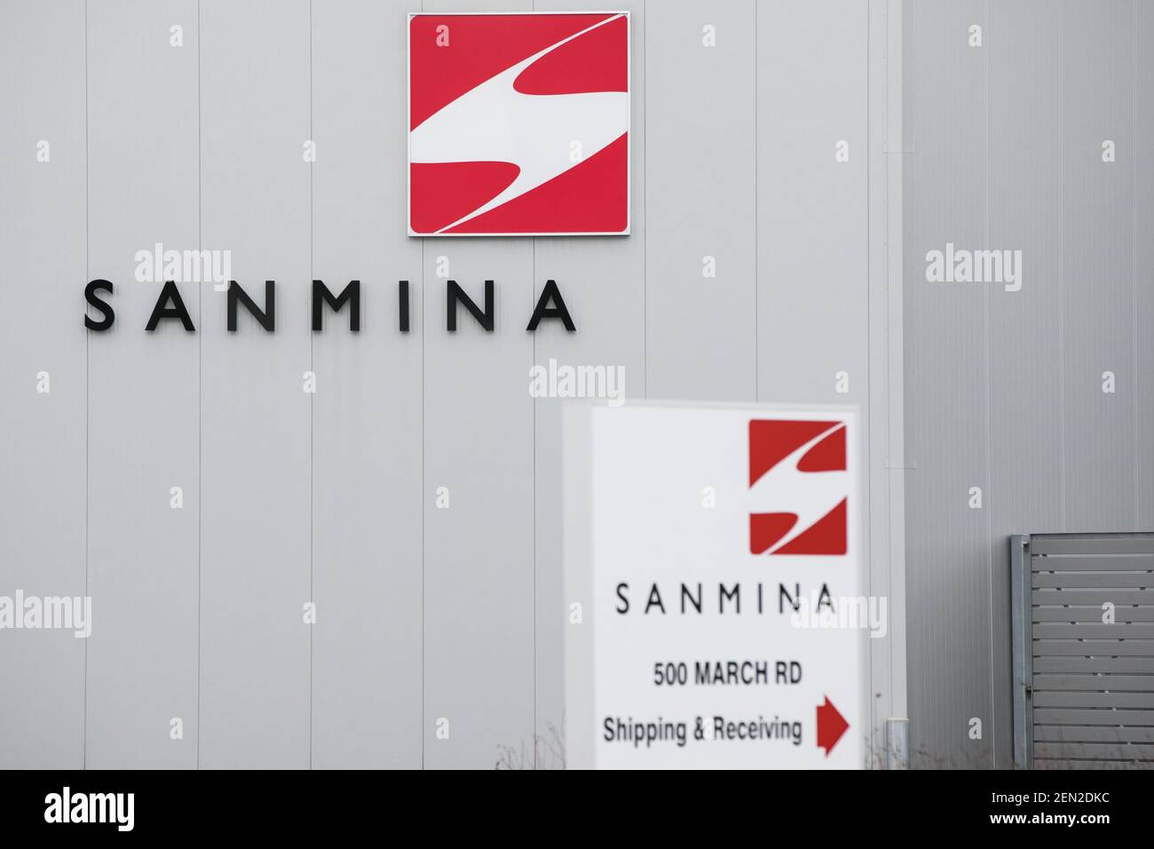 A logo sign outside of a facility occupied by the Sanmina Corporation ...