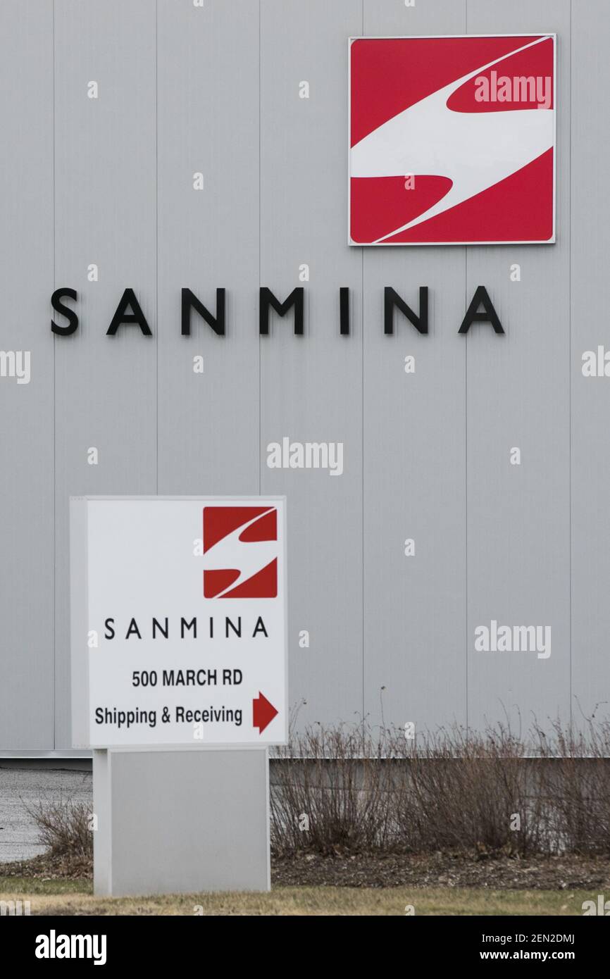 A logo sign outside of a facility occupied by the Sanmina Corporation ...