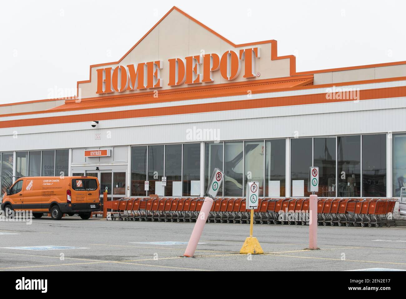 A logo sign outside of a Home Depot retail store location in Vaudreuil ...