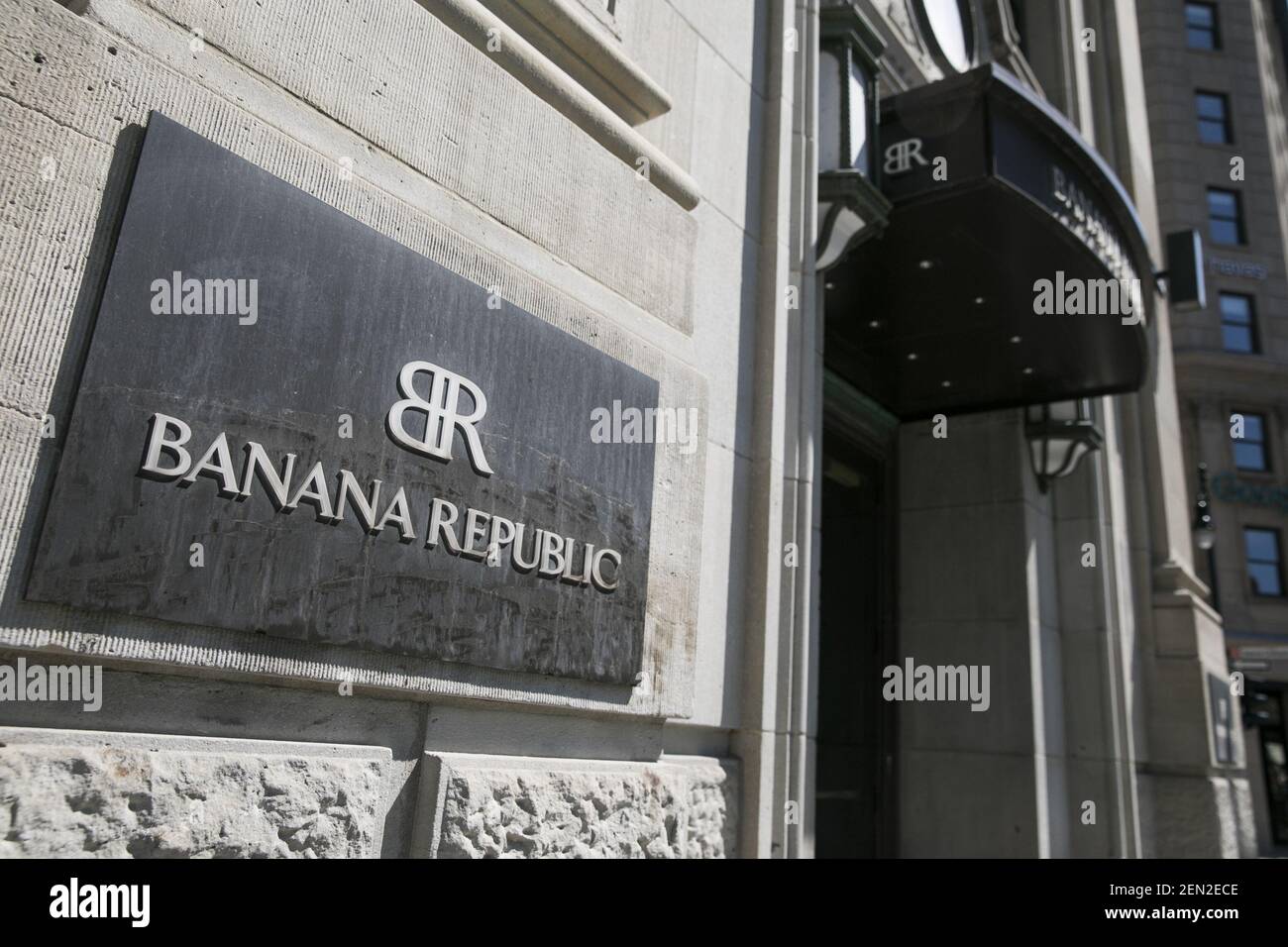 A logo sign outside of a Banana Republic retail store location in ...