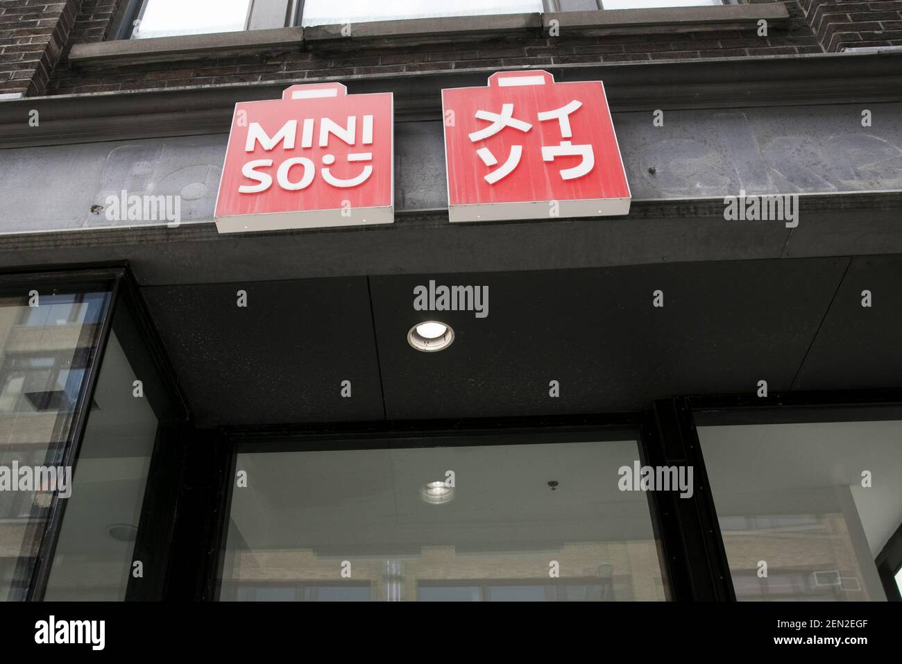 A logo sign outside of a Miniso retail store location in Montreal ...