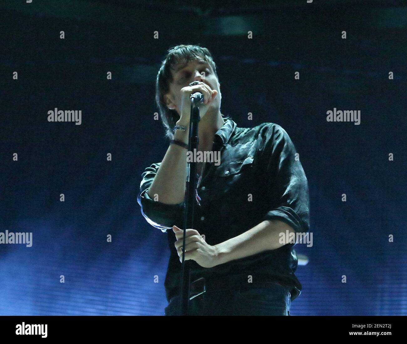 The Strokes - lead singer Julian Casablancas seen performing live on ...