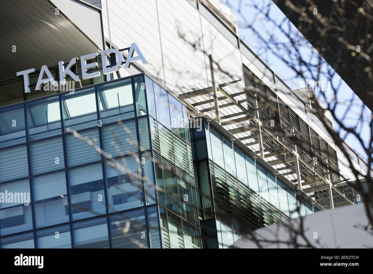 A logo sign outside of a facility occupied by the Takeda Pharmaceutical ...