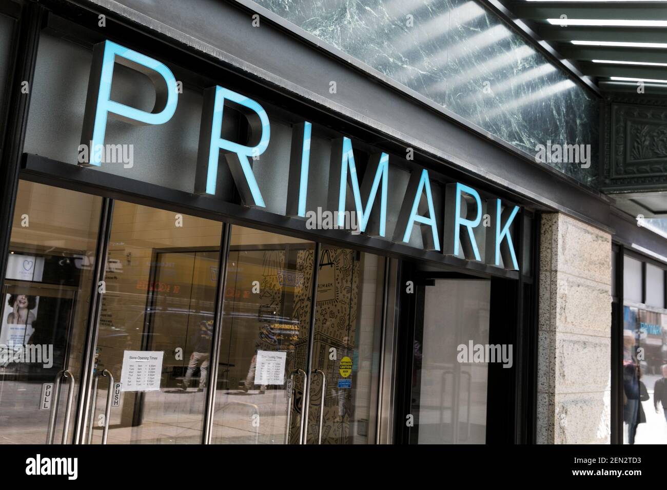 A logo sign outside of a Primark retail store location in Boston ...