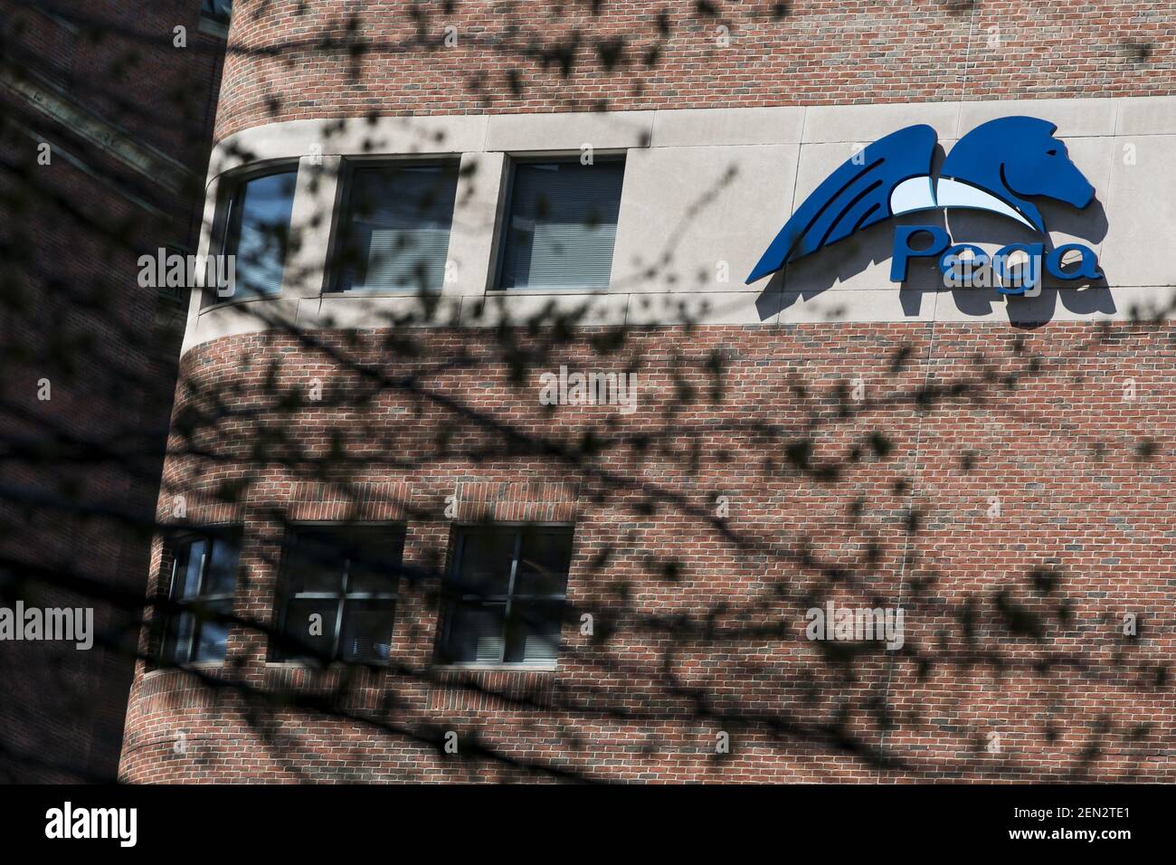 A logo sign outside of the headquarters of Pegasystems Inc., in ...