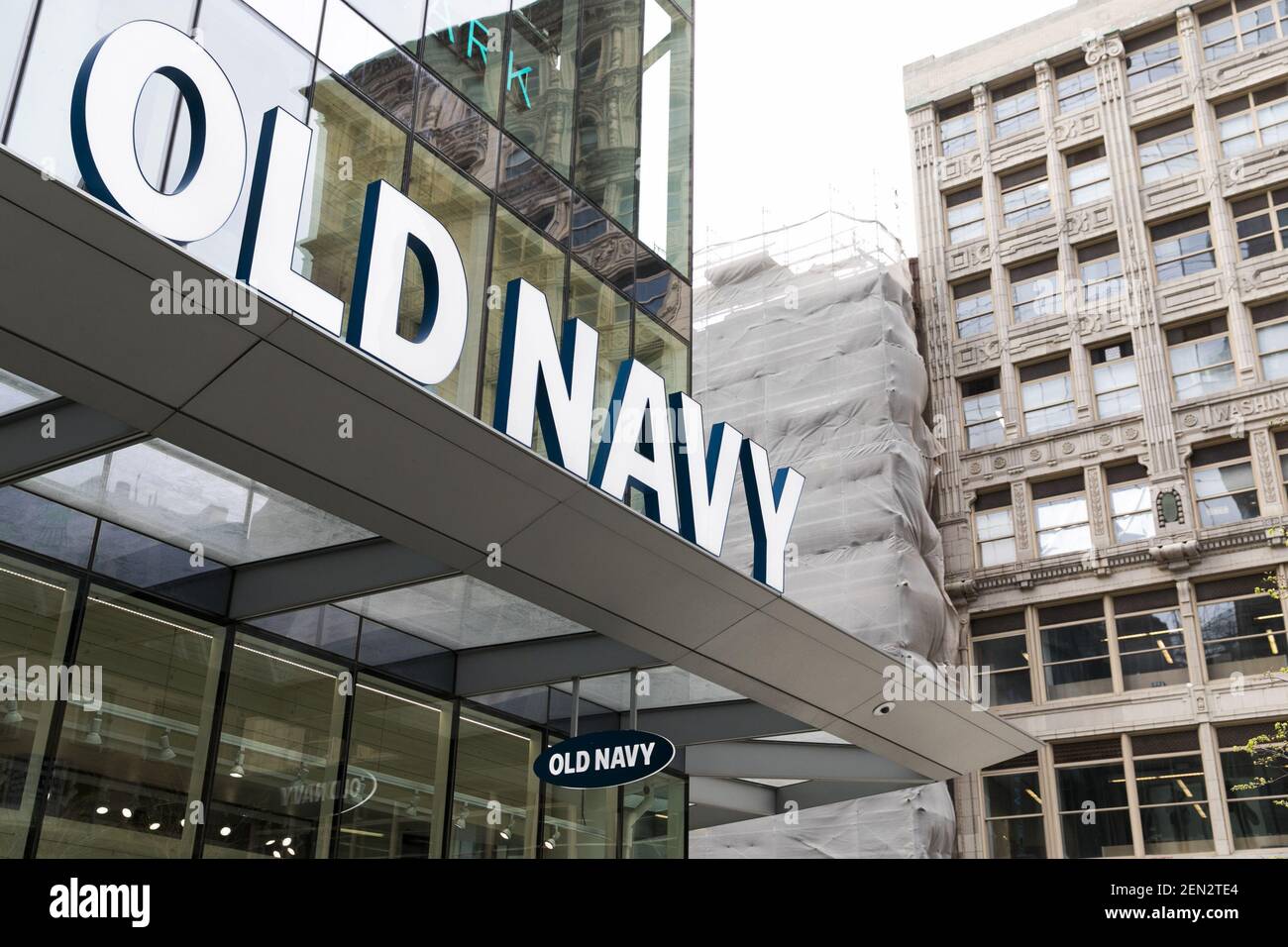 A logo sign outside of a Old Navy retail store location in Boston ...