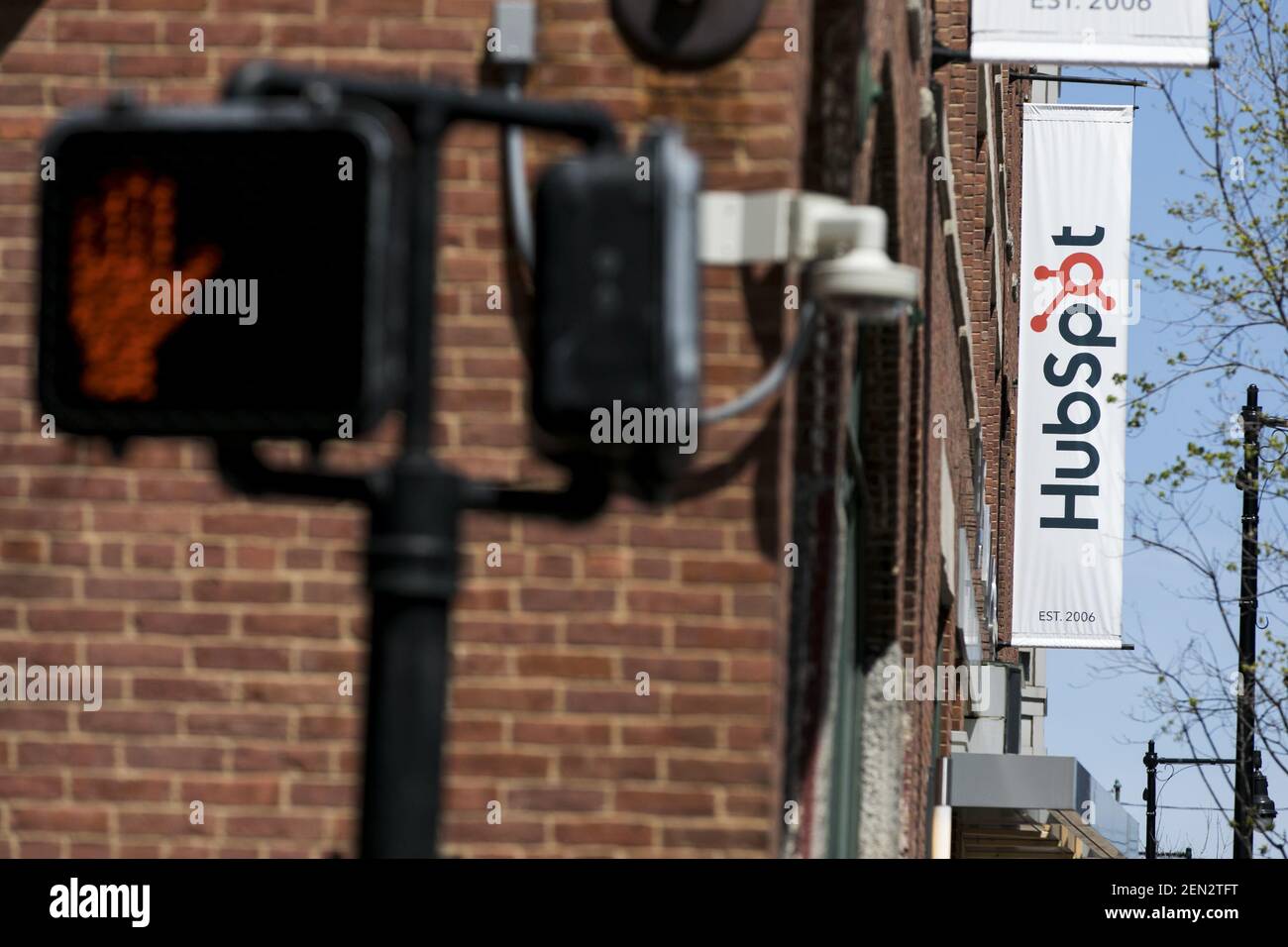 A logo sign outside of the headquarters of HubSpot in Cambridge ...