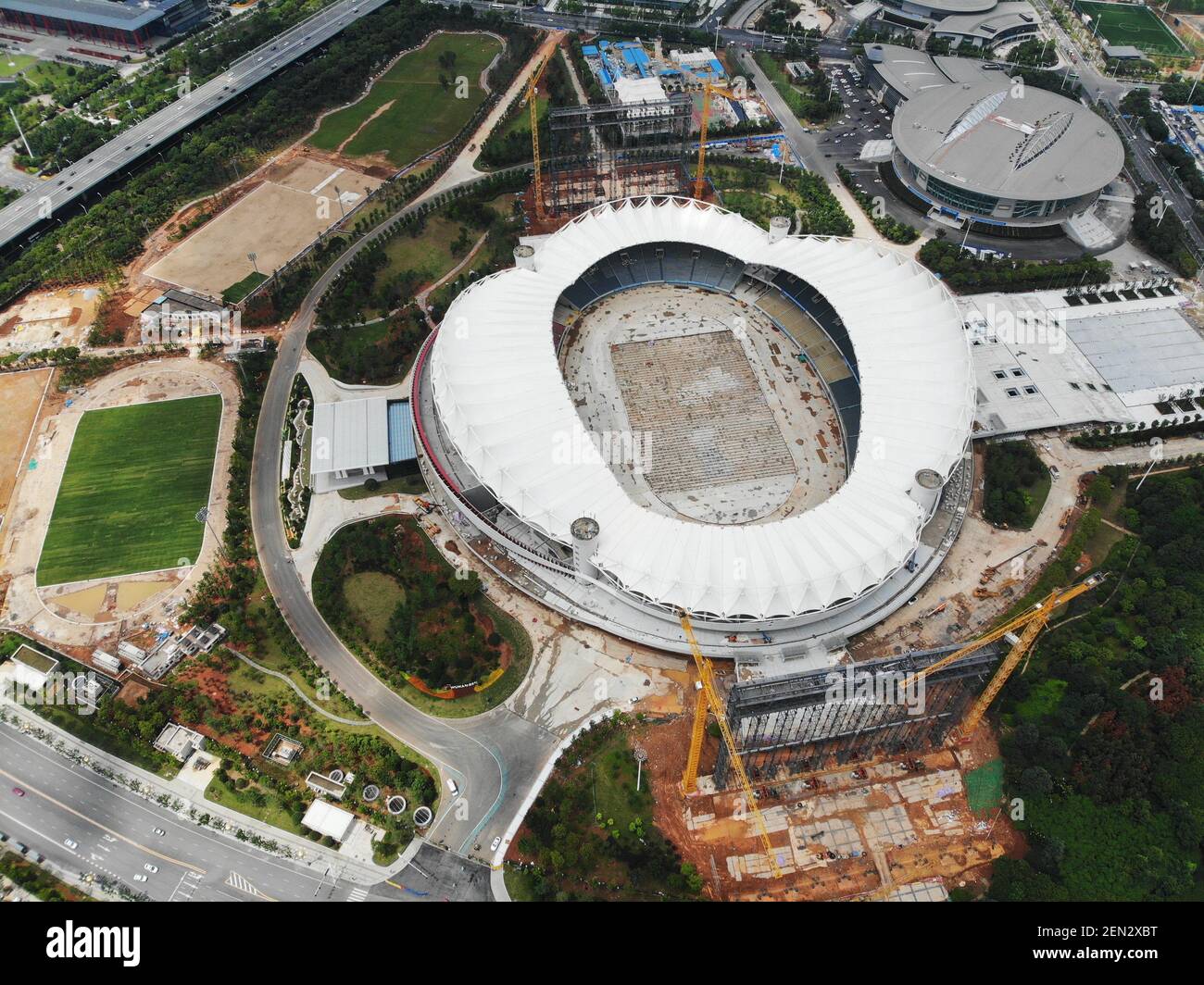 An aerial view of the Wuhan Sports Center stadium under renovation in ...
