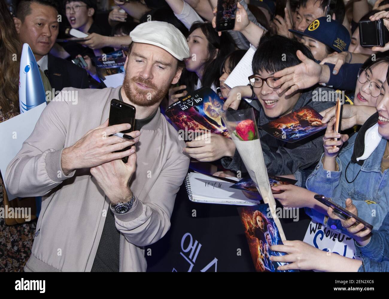 Actor Michael Fassbender attends a red carpet for the film X-Man: Dark ...