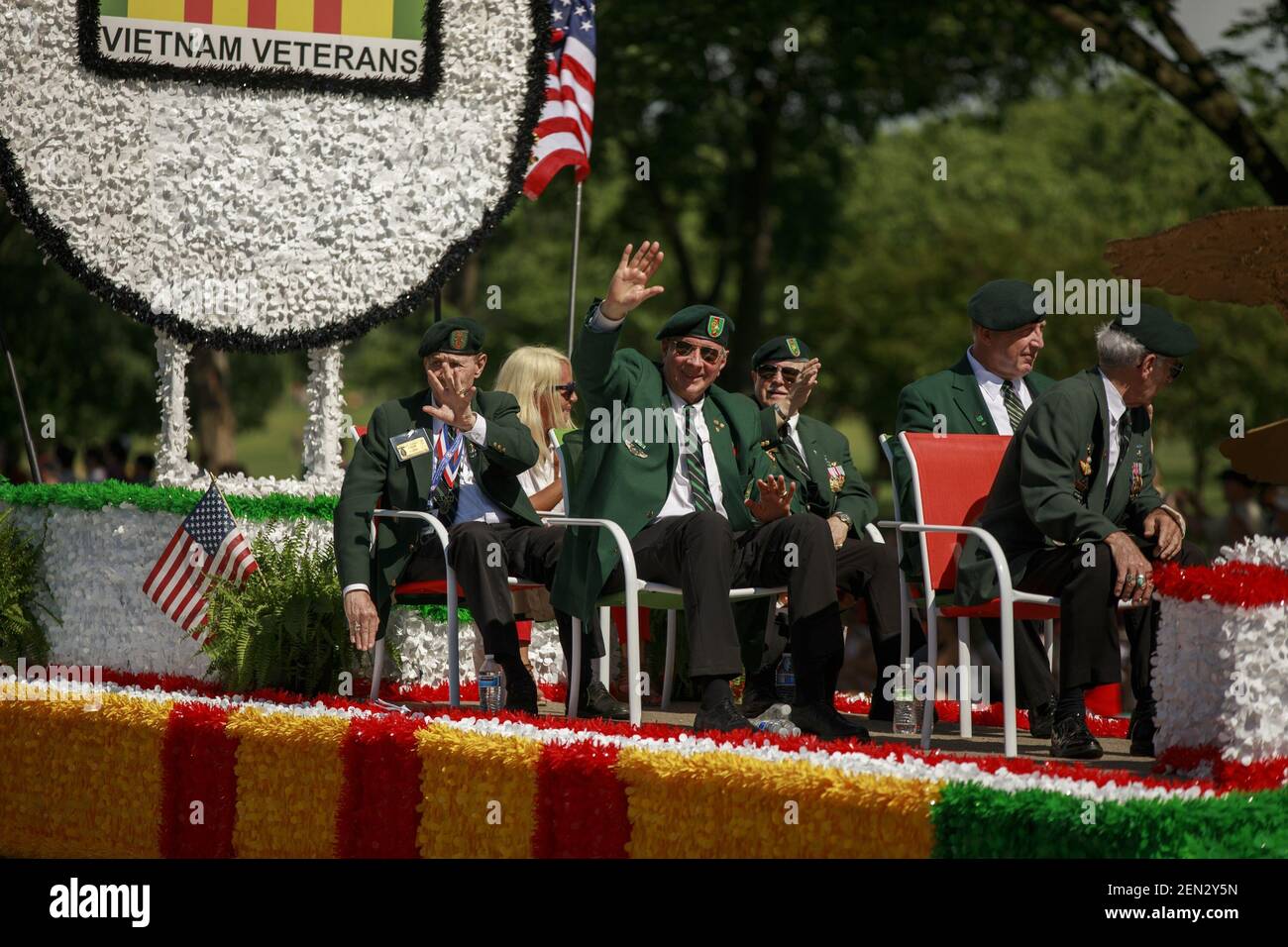 Vietnam Veterans wave from a float during the National Memorial Day ...