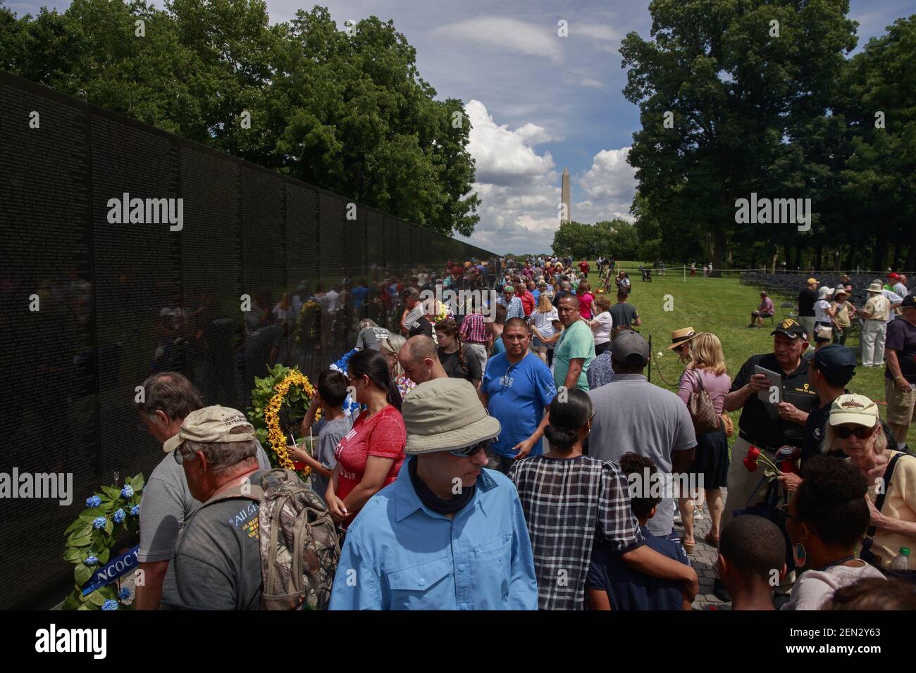 A crowd pays their respects after the wreath laying ceremony at the ...