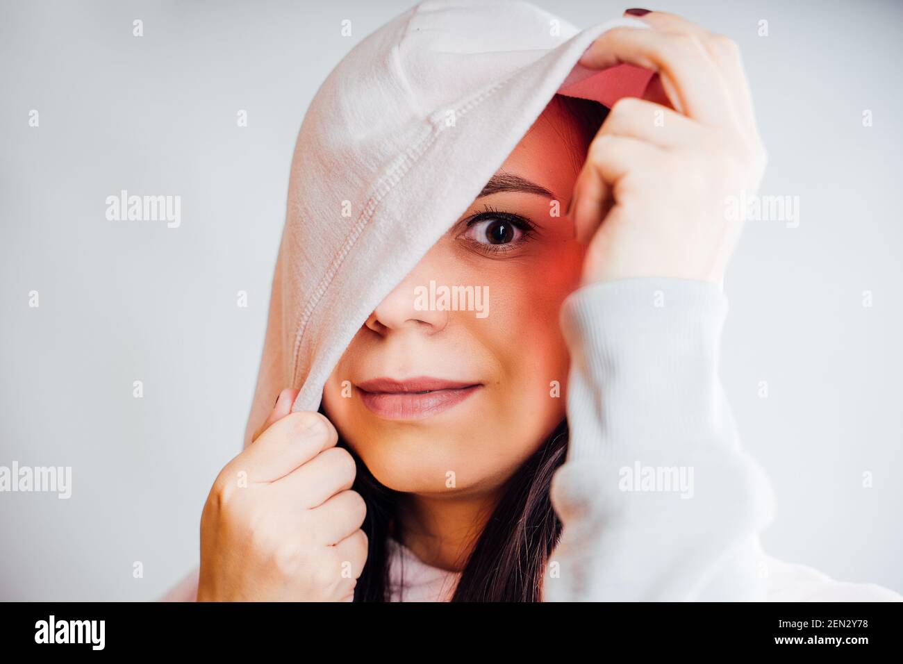 Hood covering face hi-res stock photography and images - Alamy