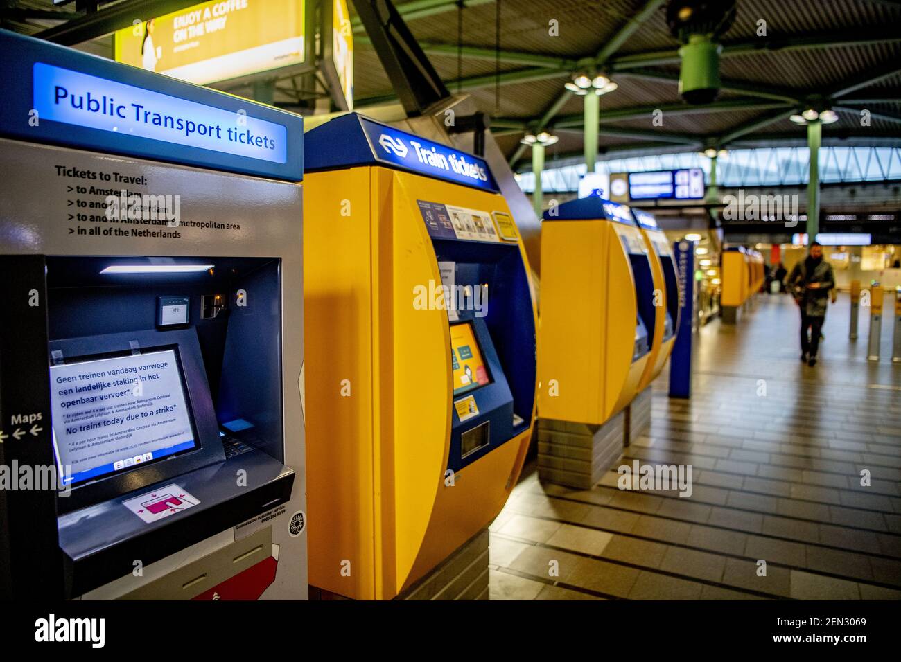 SCHIPHOL - Traveller at Schiphol station. The 24-Strike in public ...