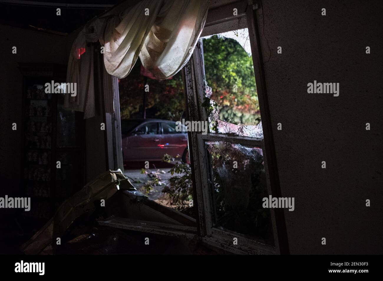 An interior view of a damaged window by Tornadoes in Celina. Multiple ...