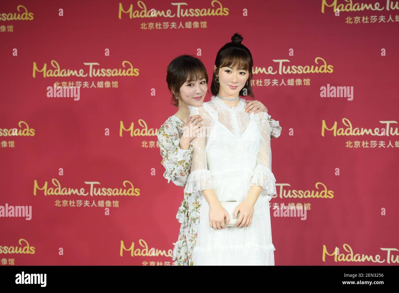 Chinese actress Andy Yang or Yang Zi poses with the wax figure of her ...
