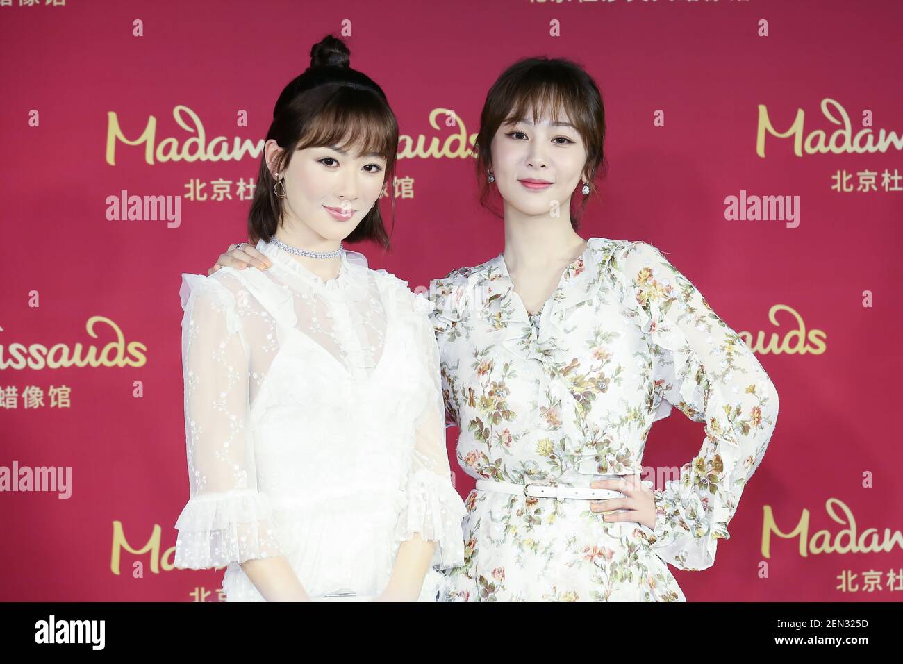 Chinese actress Andy Yang or Yang Zi poses with the wax figure of her ...