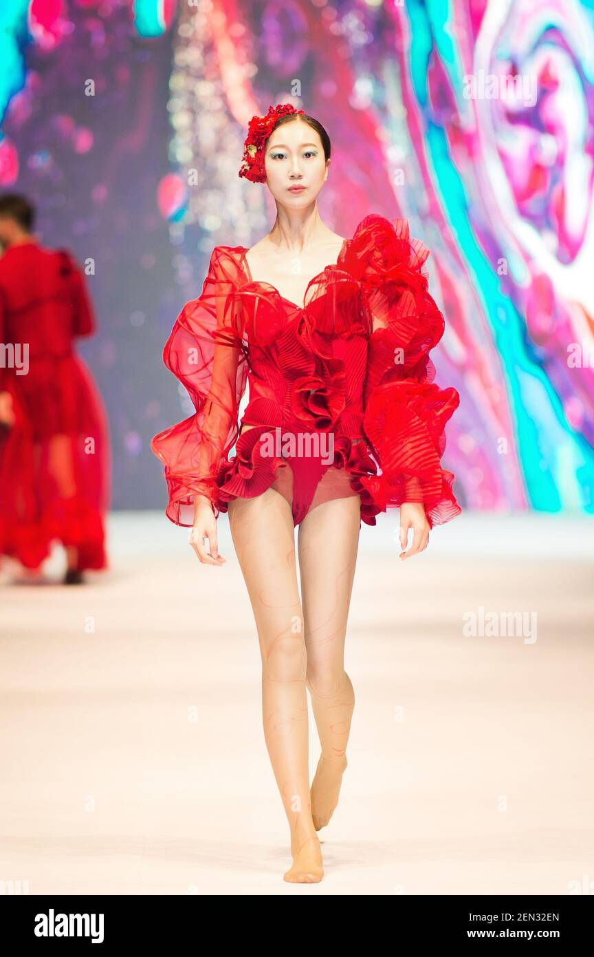 Shenyang, CHINA-A model presents a creation designed by graduates of Lu ...