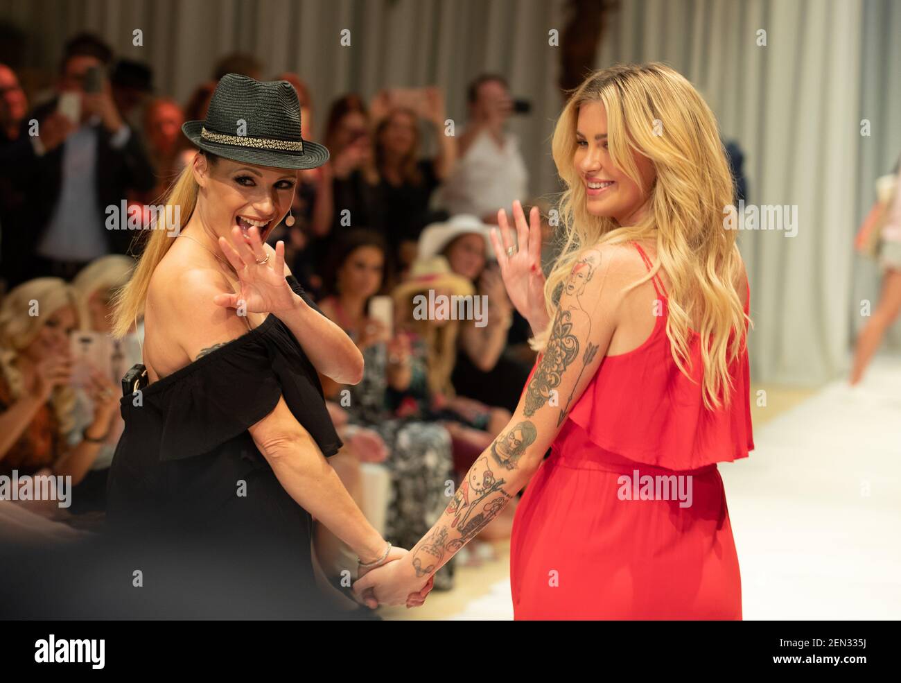 Michelle Hunziker (l.) and Ireland Basinger Baldwin walking along the ...