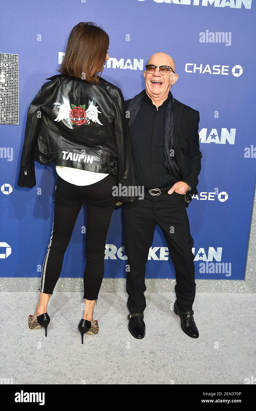 Bernie Taupin and wife Heather Lynn Hodgins Kidd attend the "ROCKETMAN ...
