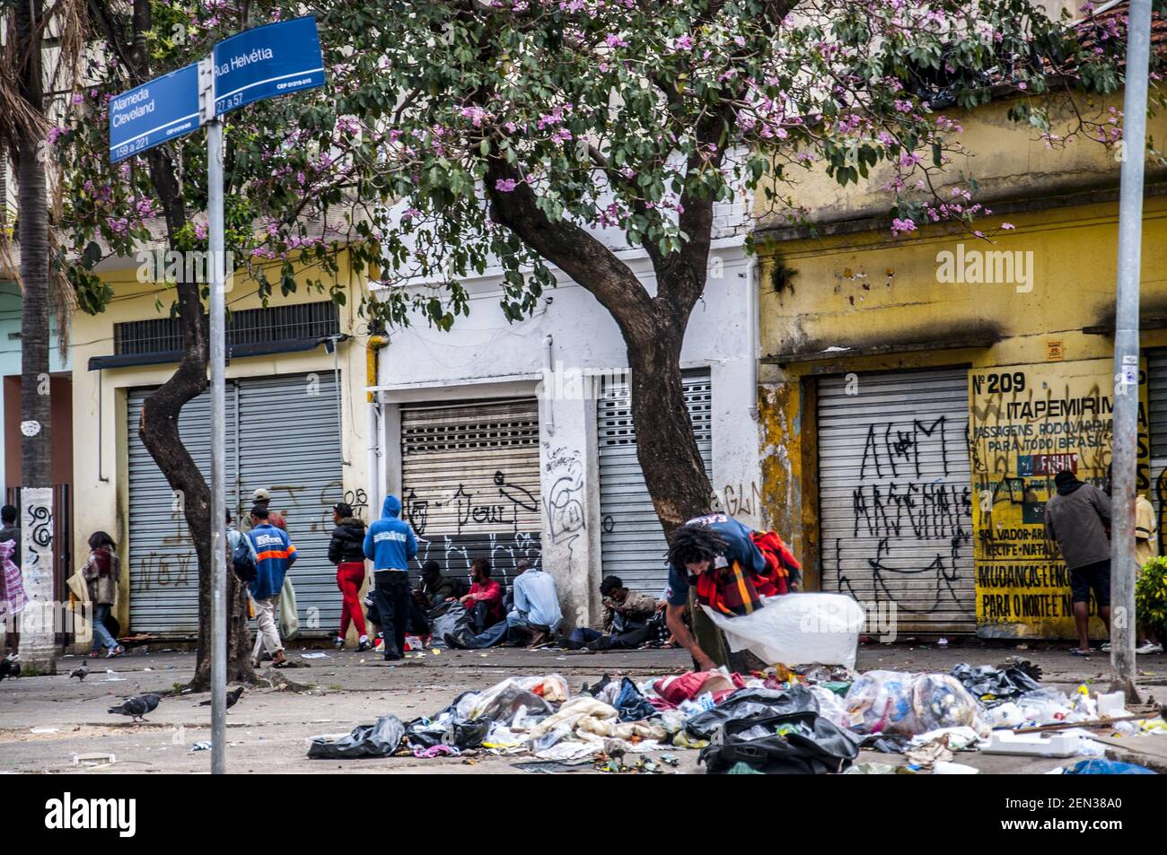 People believed to be addicted to drugs gather in the street referred ...