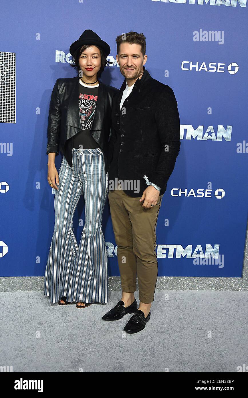 Matthew Morrison and wife Renee Puente attends the "ROCKETMAN" New York ...