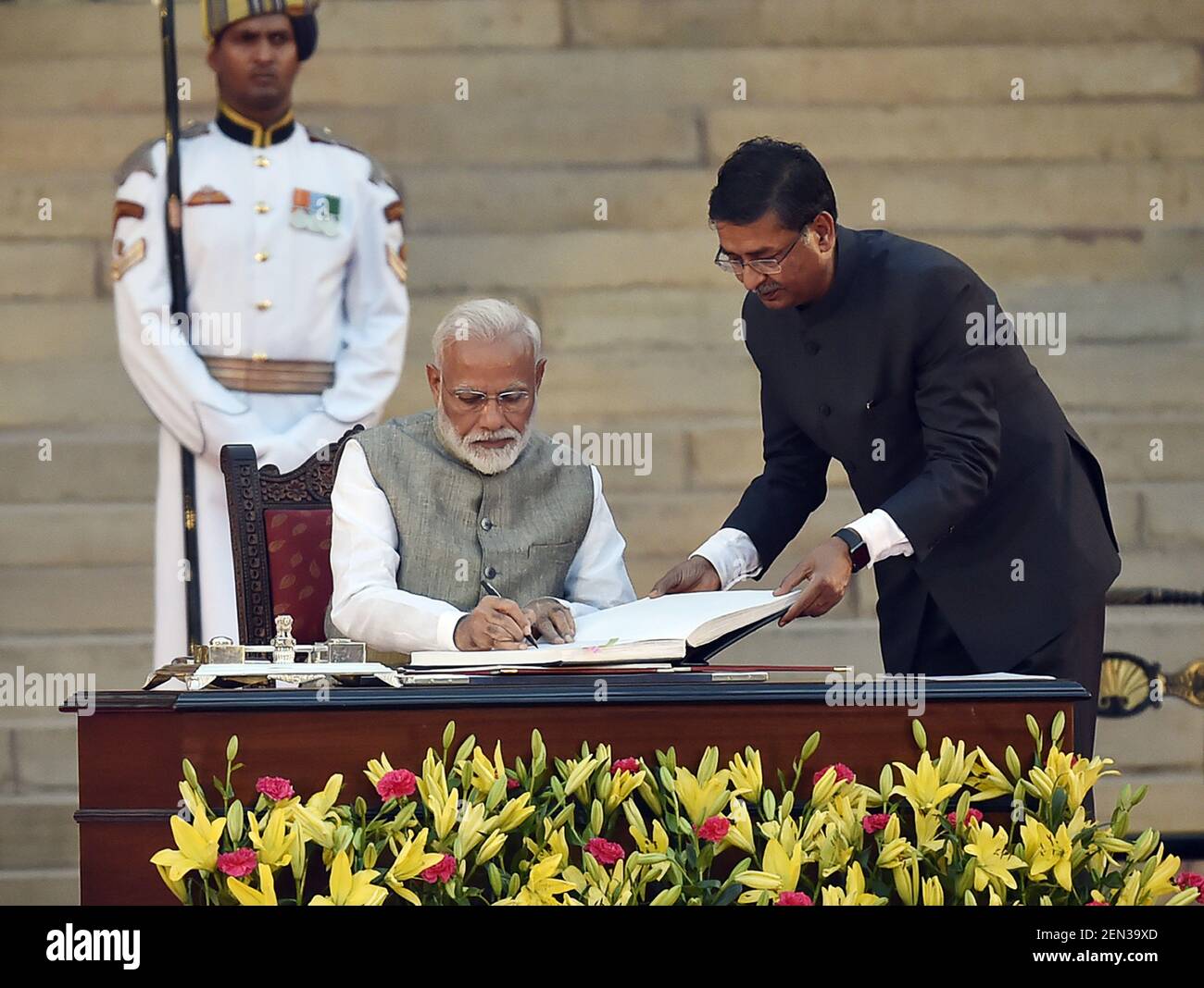 NEW DELHI, INDIA - MAY 30: Prime Minister Narendra Modi signs the ...