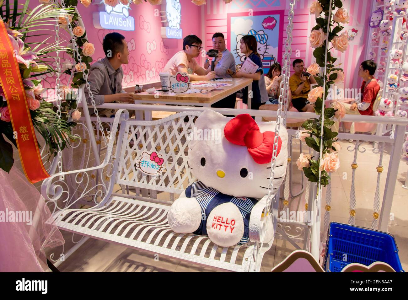 Customers shop at a Hello Kitty-themed Lawson convenience store in ...