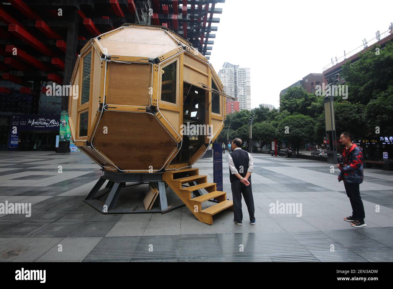 Local residents read books at a reading room resembling a space capsule ...