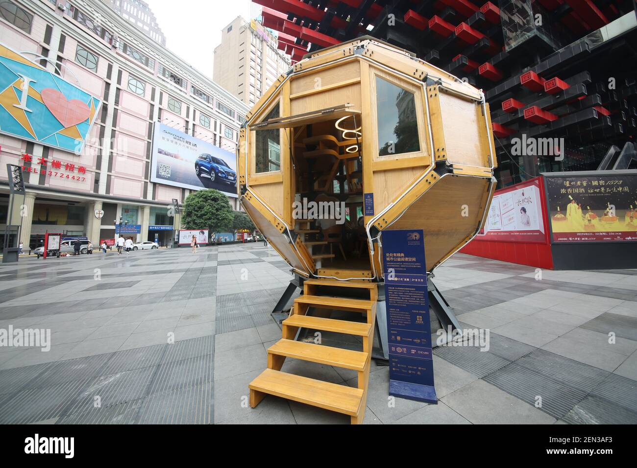 Local residents read books at a reading room resembling a space capsule ...