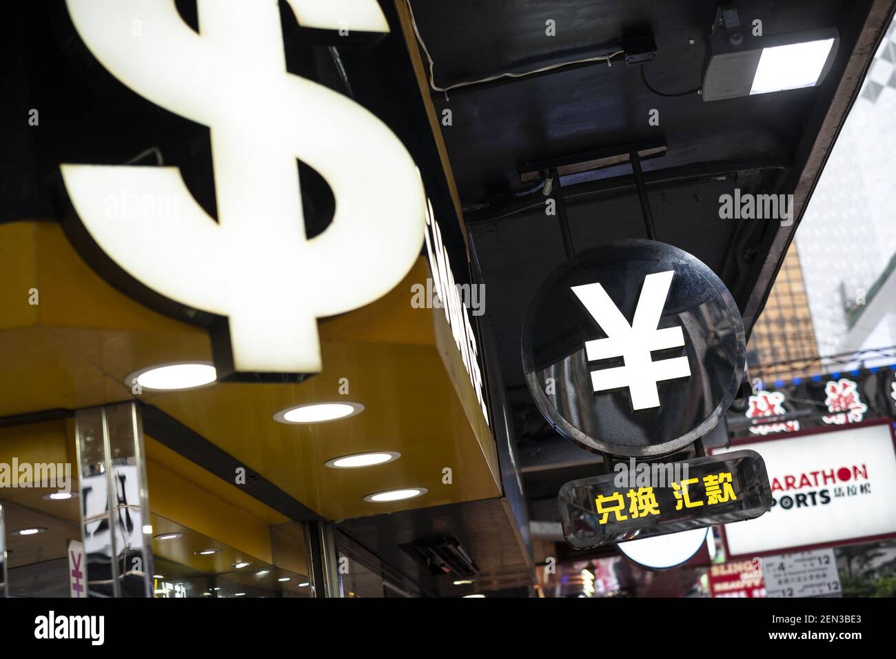 A Dollar and RMB sign seen on a currency exchange shop in Hong Kong ...