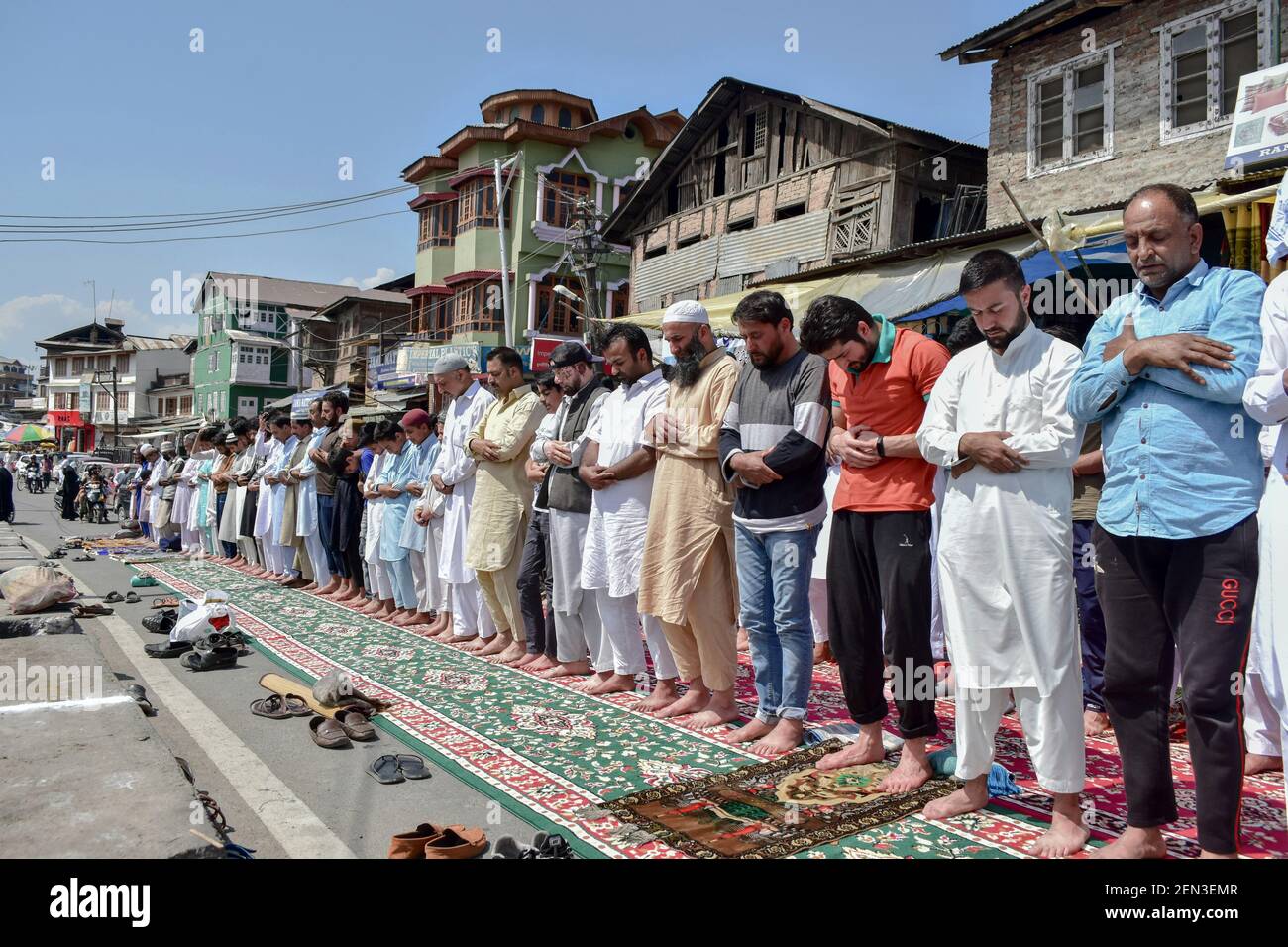Kashmiri Muslims offer prayers outside the historic Grand Mosque or ...