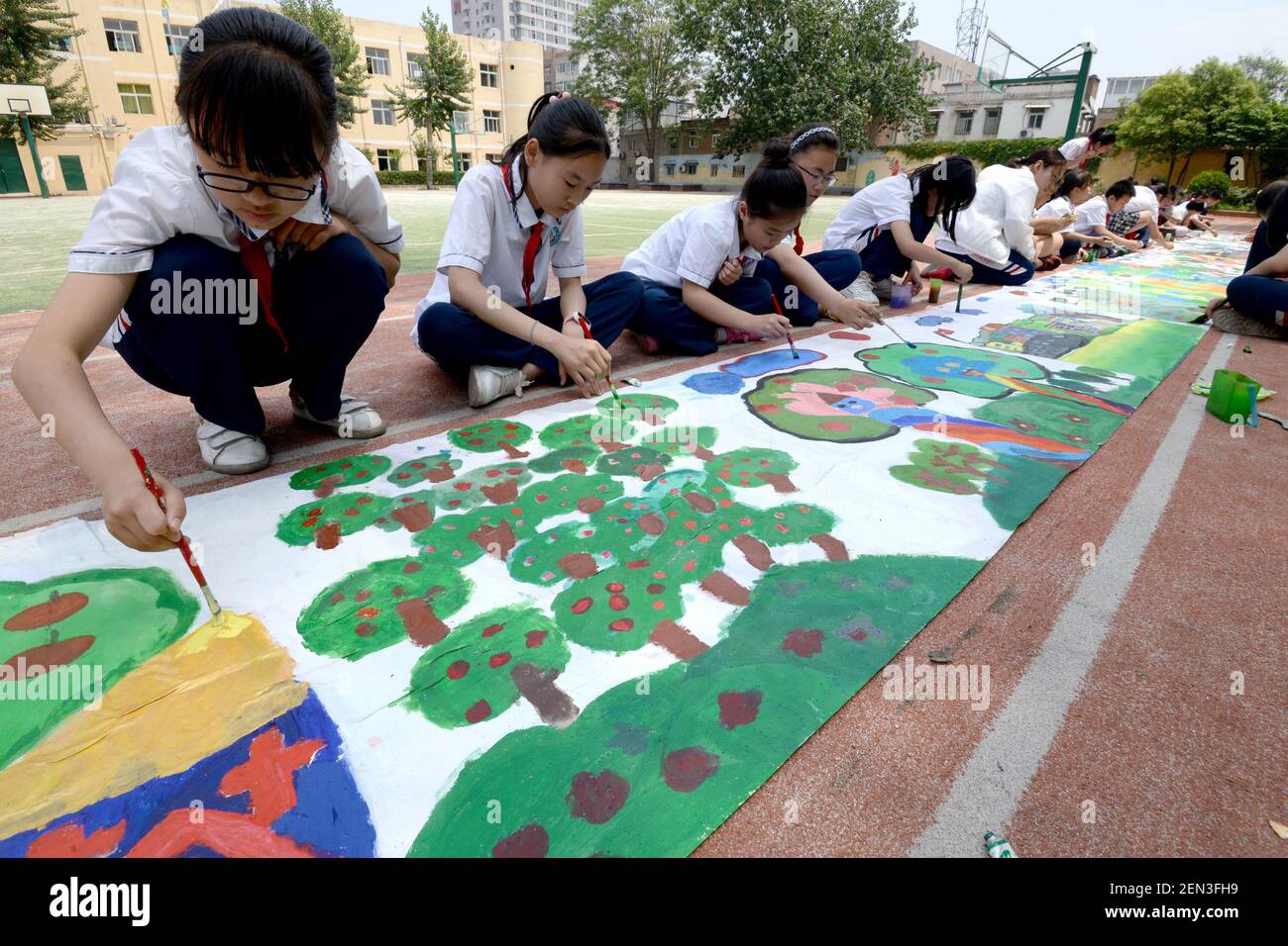 Handan, CHINA-Kids draw a 100-meter-long painting at Nanguan Primary ...