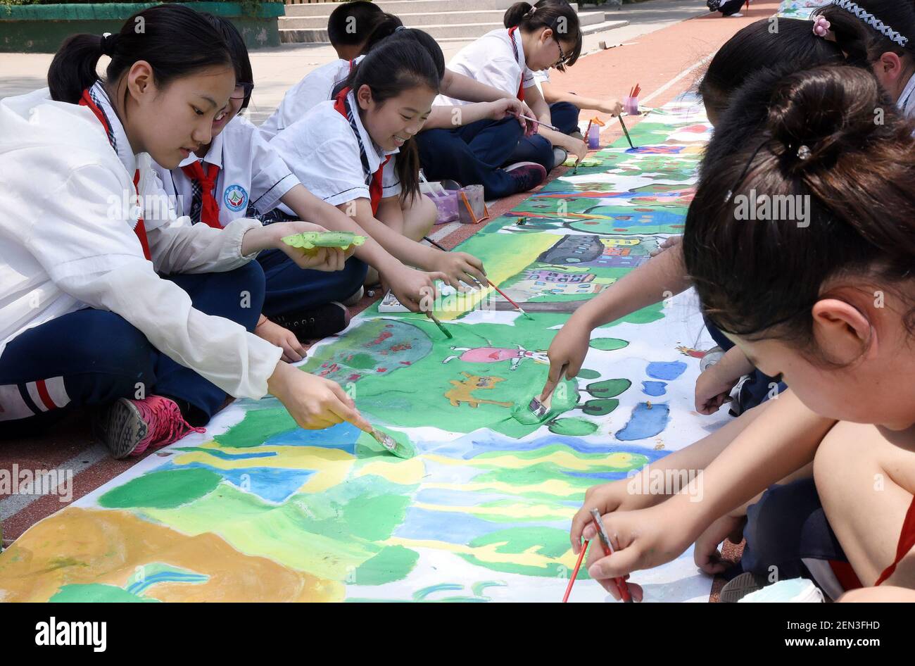 Handan, CHINA-Kids draw a 100-meter-long painting at Nanguan Primary ...