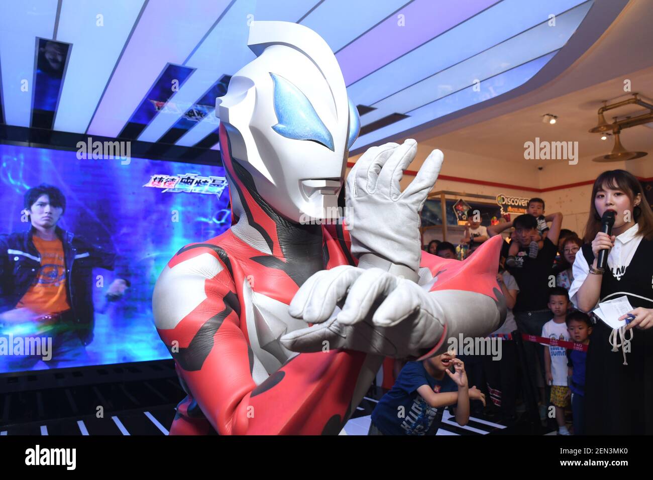 A Chinese worker dresses up as Ultraman Geed from Japanese tokusatsu ...