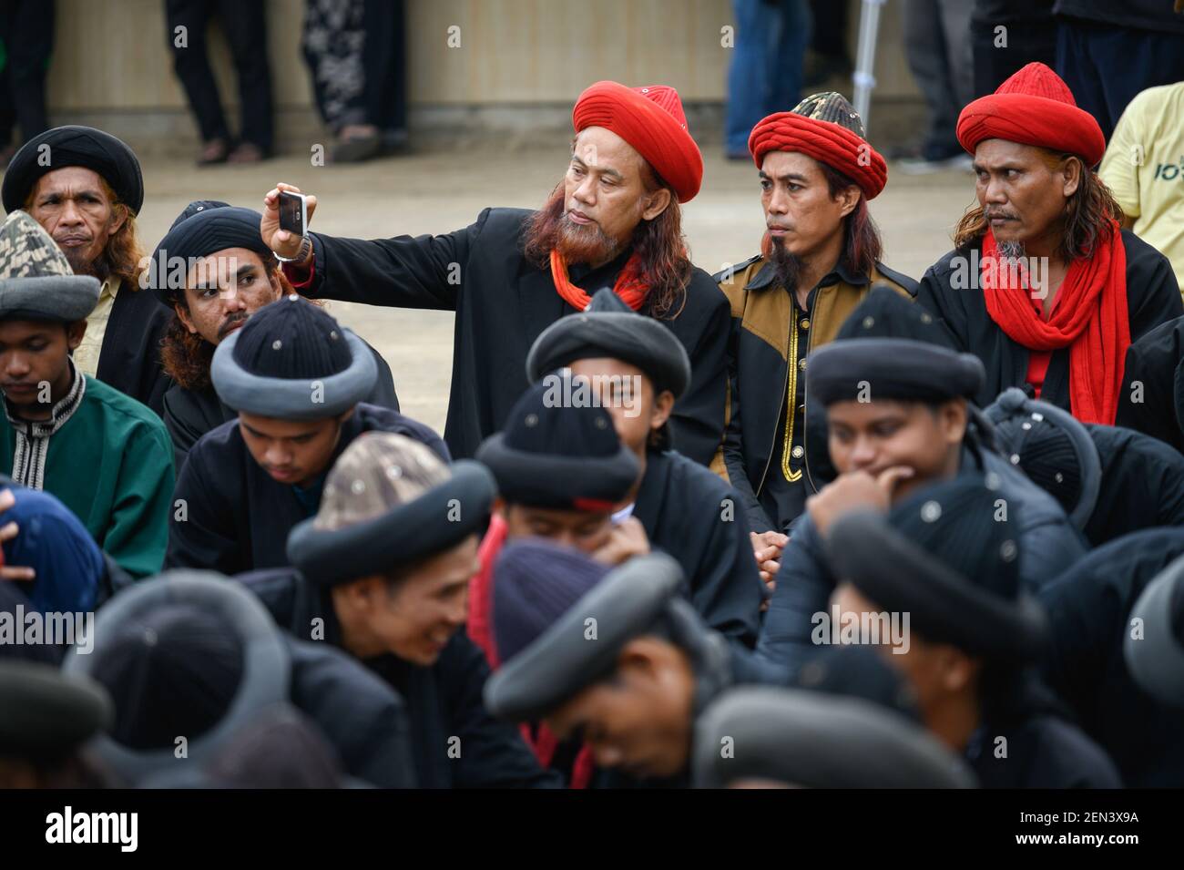 A man from the Islamic commune An-Nadzir takes a seflie as he attend ...