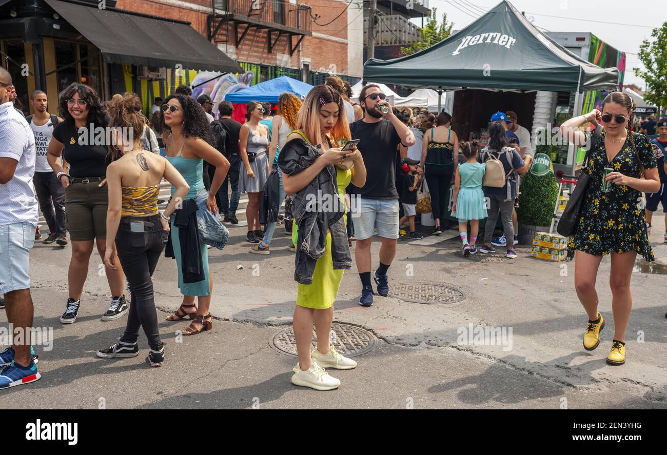 Thousands pour into Bushwick, Brooklyn in New York for the annual ...