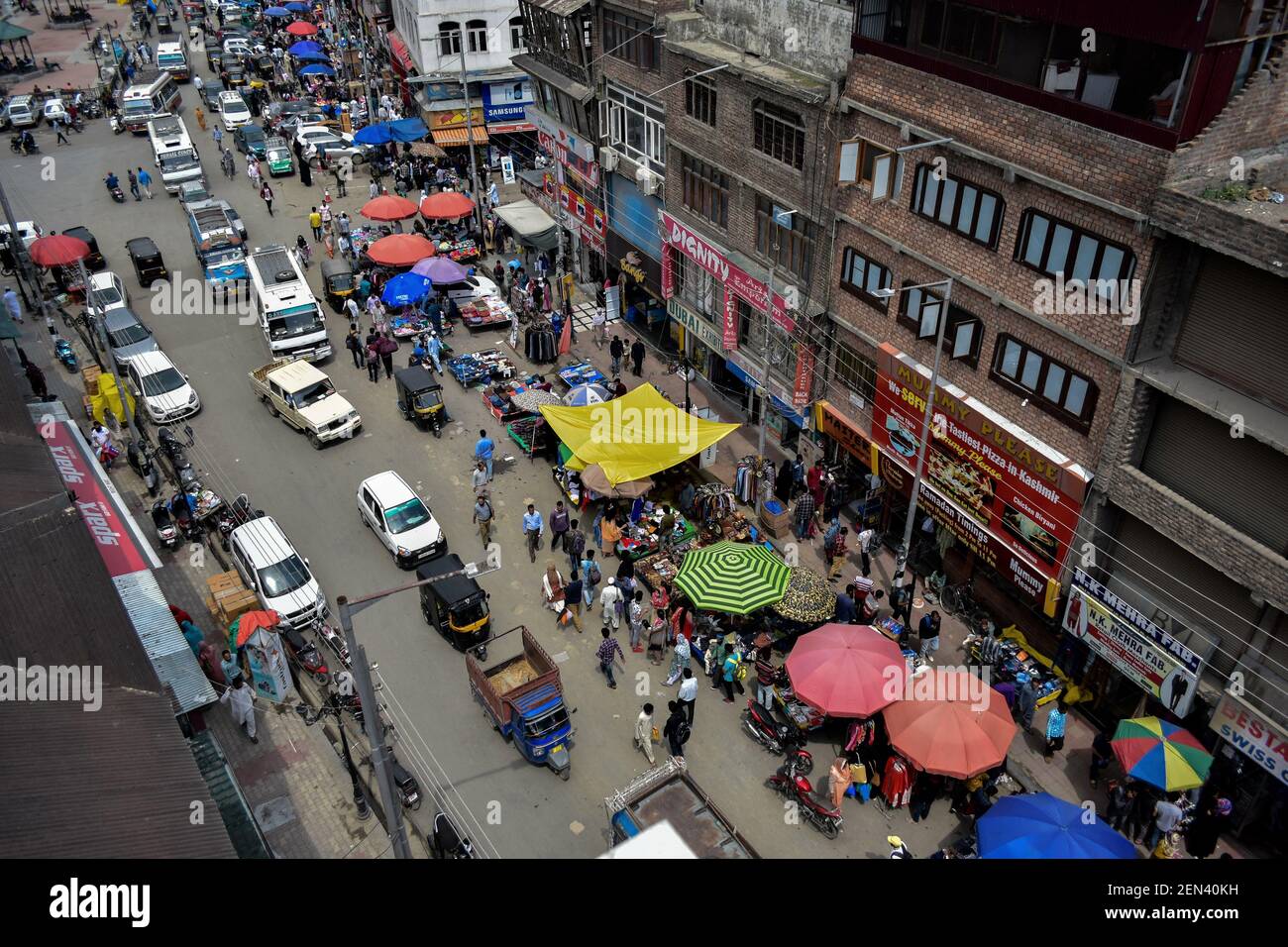 Kashmiri residents shopping ahead of Muslim festival Eid al-Fitr at a ...