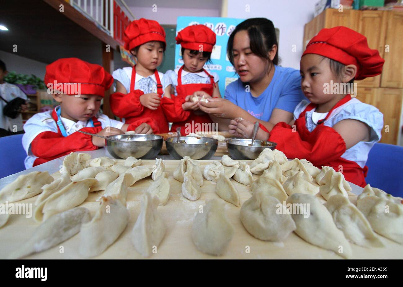 Handan, CHINA-Kids experience different vocations including nurse and ...