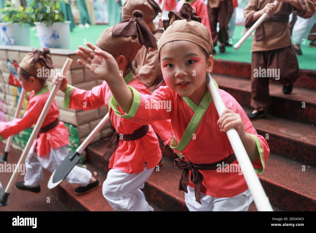 Huaying, CHINA-Kids wearing traditional Chinese clothes hanfu ...