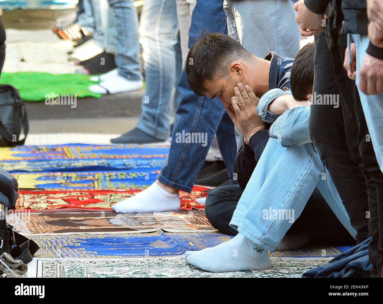 The Eid al-Fitr. Muslims during the ceremonial prayer at the Old Mosque ...