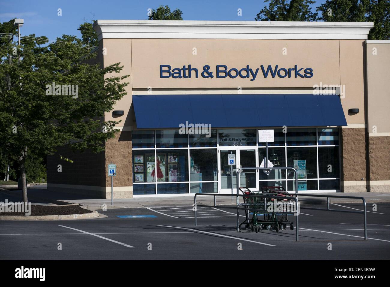 A logo sign outside of a Bath & Body Works retail store location in Martinsburg, West Virginia ...