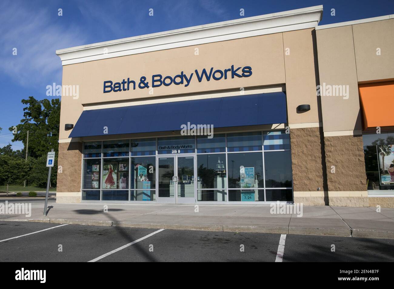 A logo sign outside of a Bath & Body Works retail store location in Martinsburg, West Virginia ...