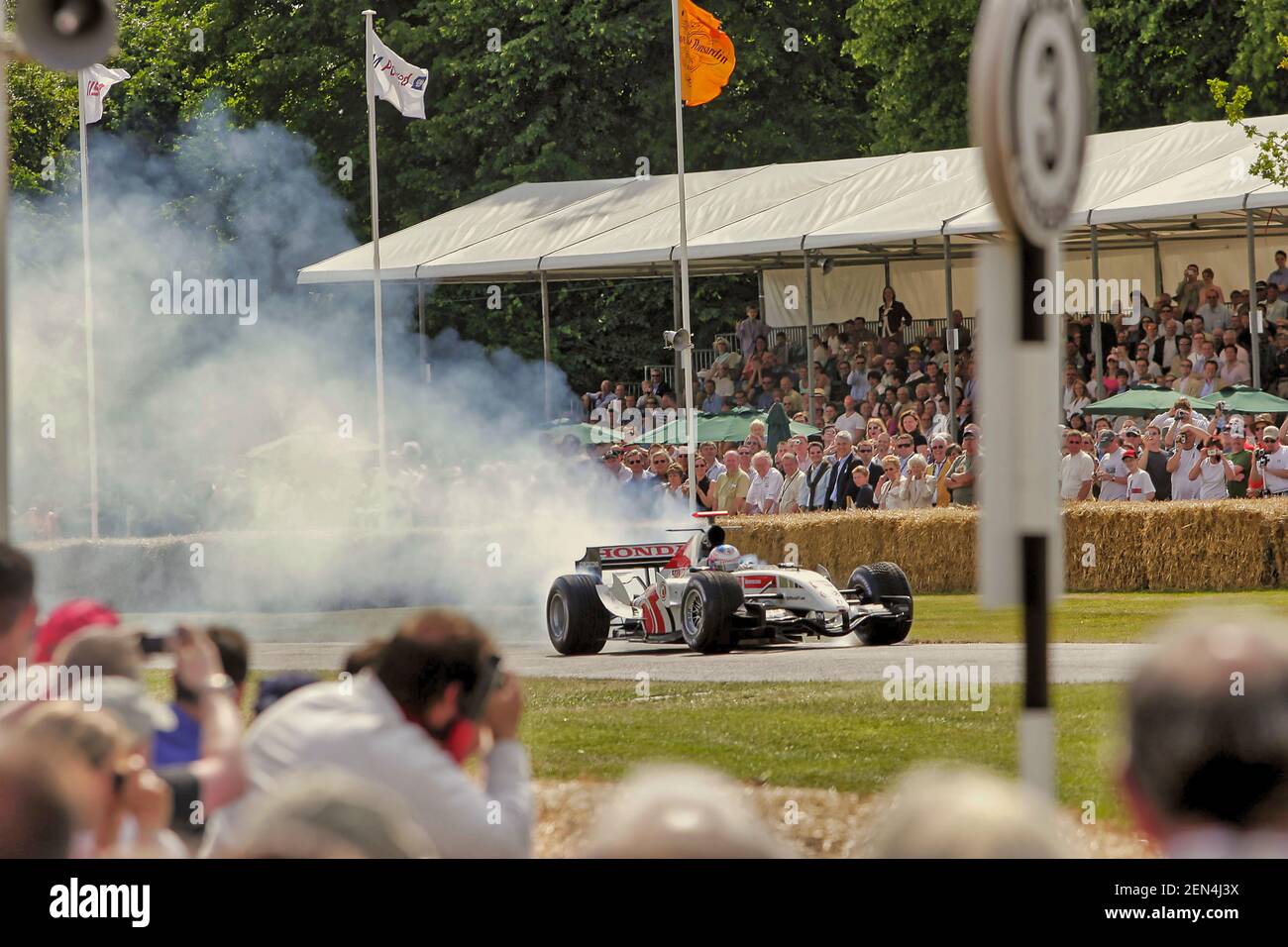 Jenson Button burns rubber in his BAR Honda at the Goodwood Festival of ...