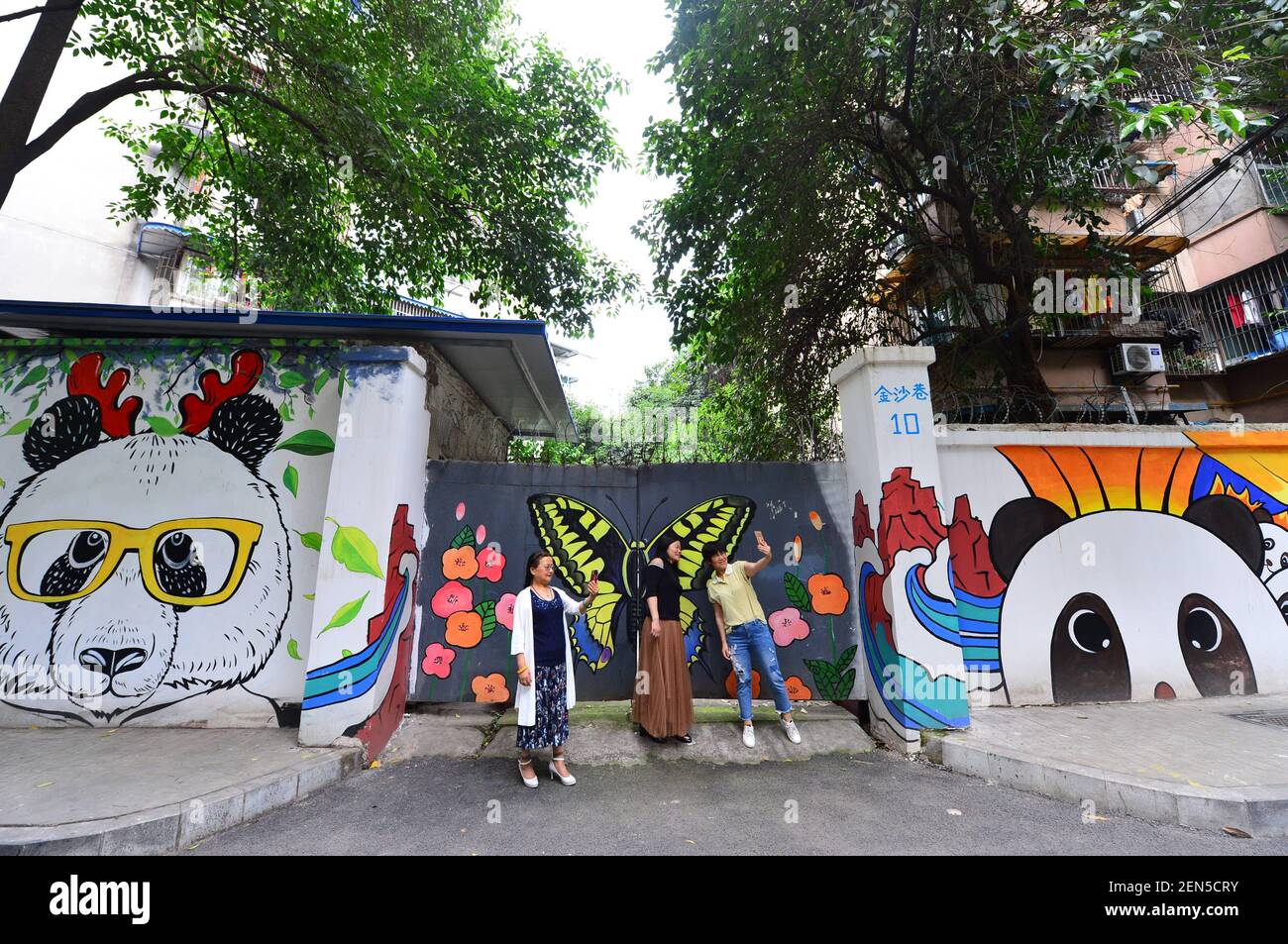 Colorful wall paintings feature giant pandas in an alley in Chengdu ...