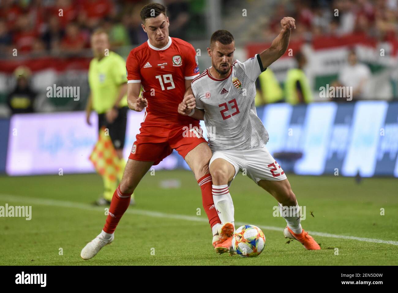 Tom Lawrence of Wales duels with Filip Holender of Hungary during the ... Tom Lawrence of Wales duels with Filip Holender of Hungary during the ...