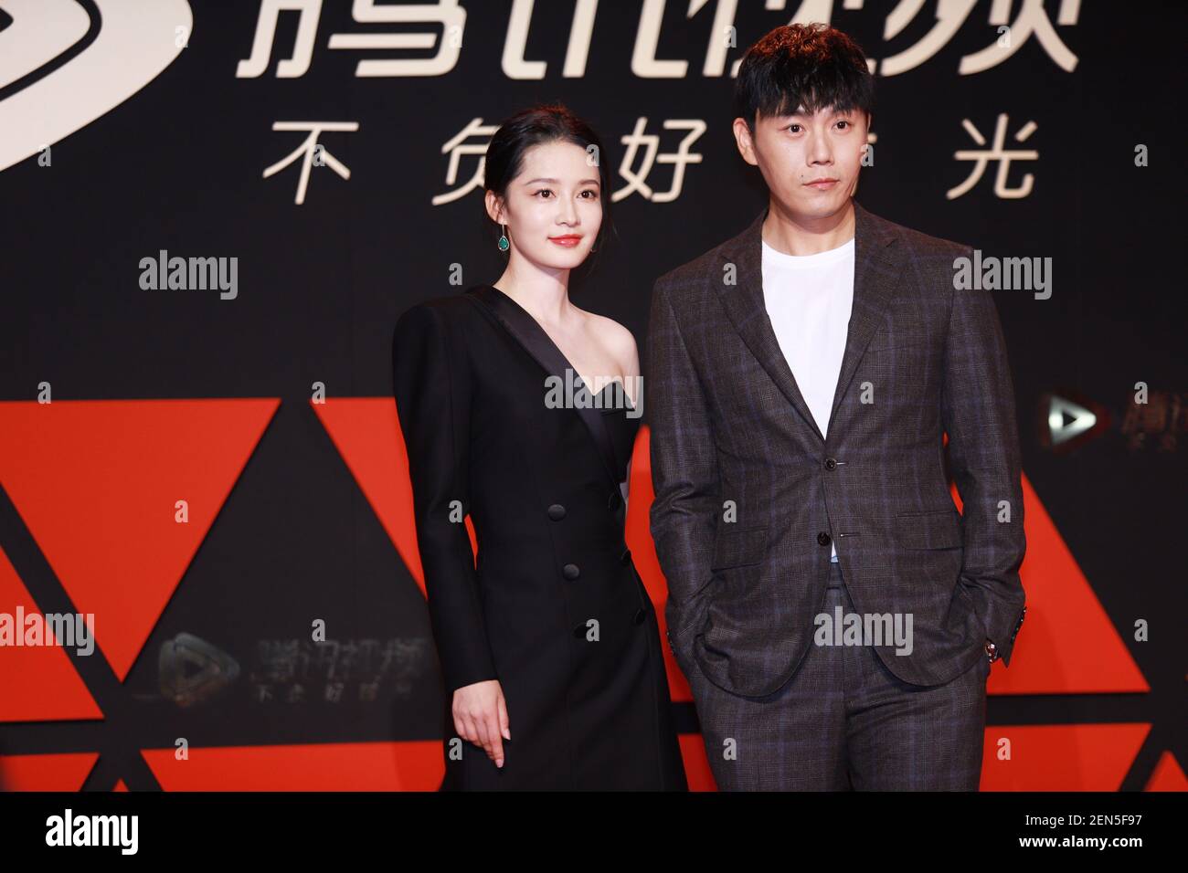 Chinese actress Li Qin, left, and actor Qin Hao attend the press ...