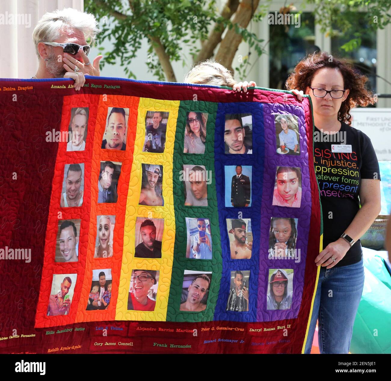 Douglas Barrett, left, and Rev. Shelly Denmark, right, with others ...