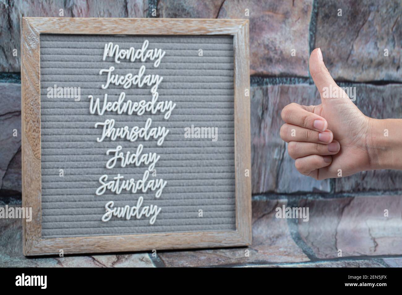 Name of weekdays embedded on grey background Stock Photo - Alamy
