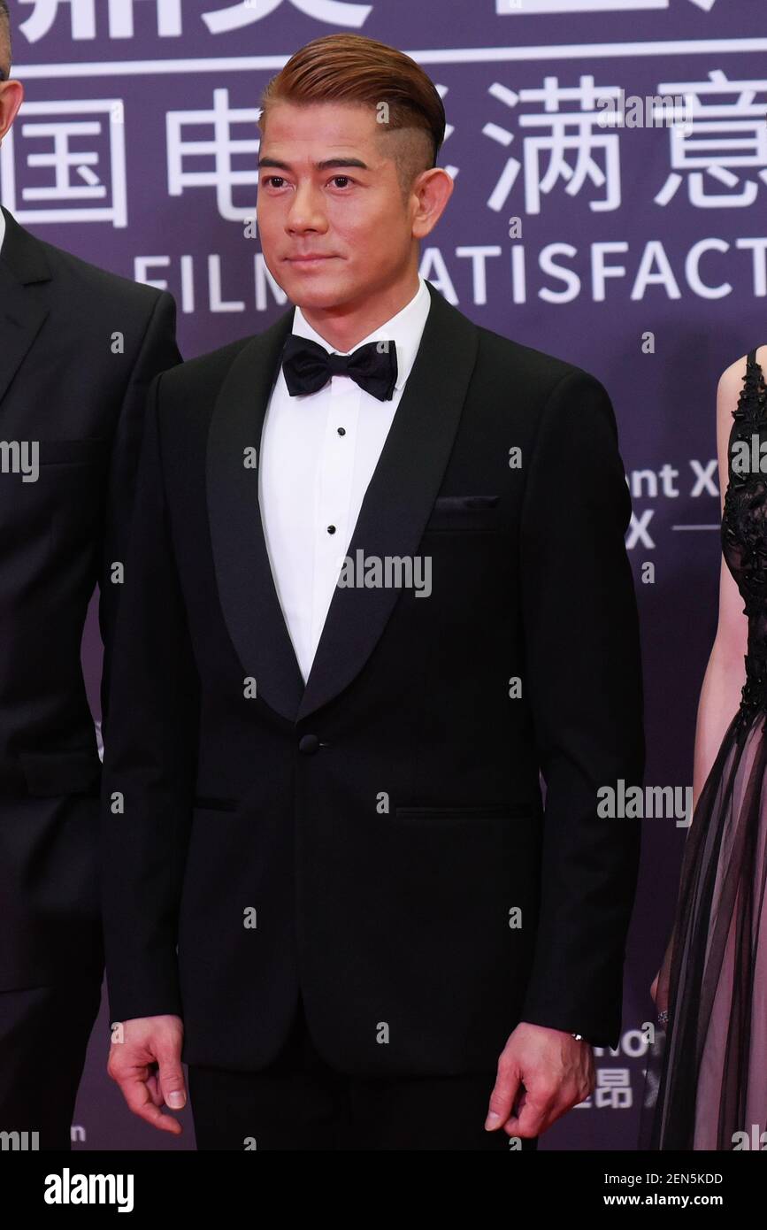 Hong Kong singer and actor Aaron Kwok poses as he arrives on the red ...